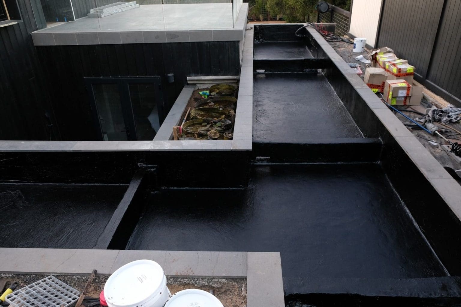 Black, non toxic liquid waterproofing membrane